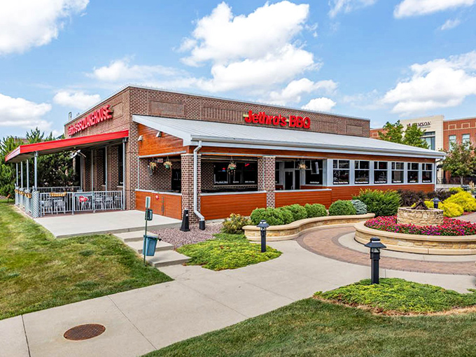 Brick, awnings, and meticulous landscaping create curb appeal that whispers "this place cares about details" before you even taste the food.