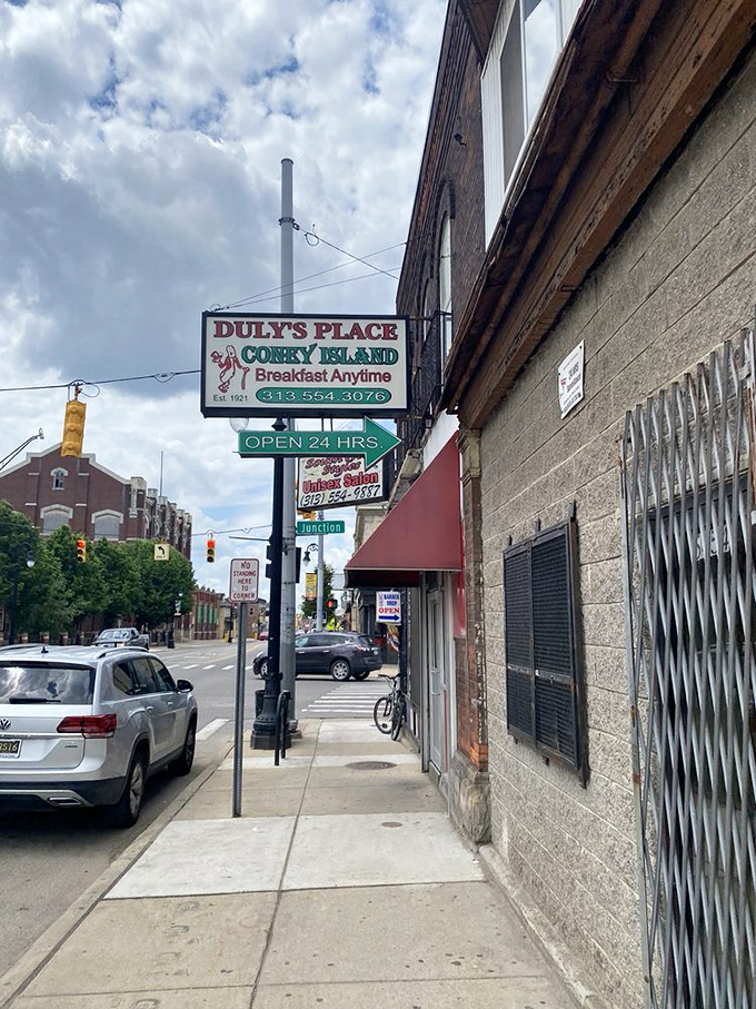 The sidewalk view that's welcomed hungry patrons for decades. That "OPEN 24 HRS" sign is both a promise and a comfort.