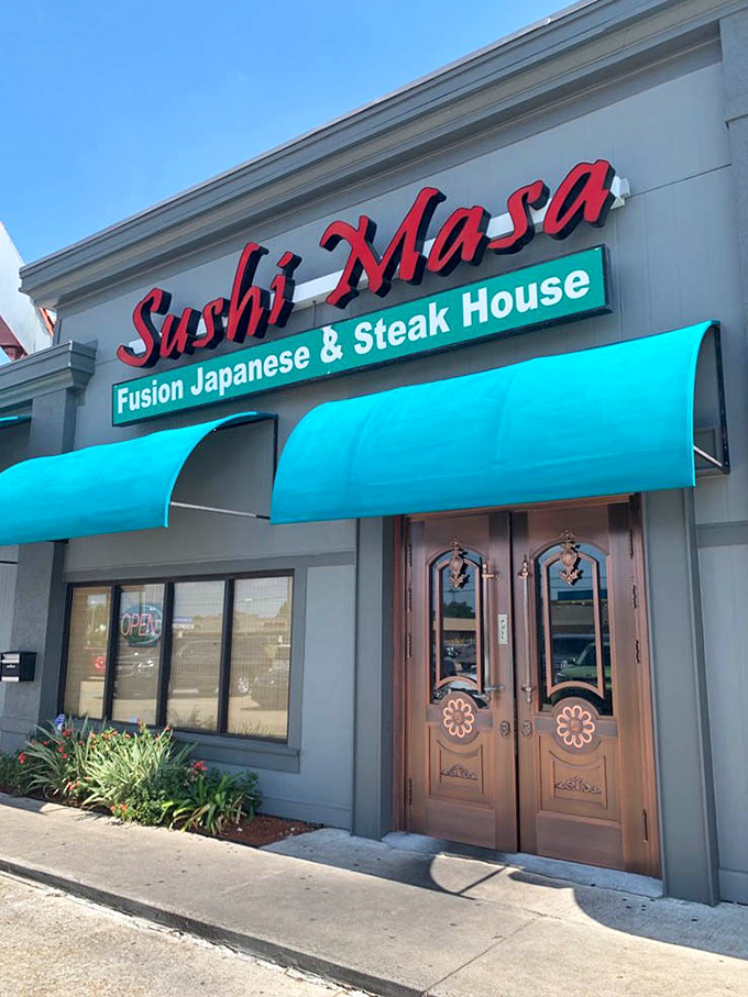 Those ornate wooden doors aren't just an entrance&mdash;they're a portal to a different culinary dimension right in Baton Rouge.