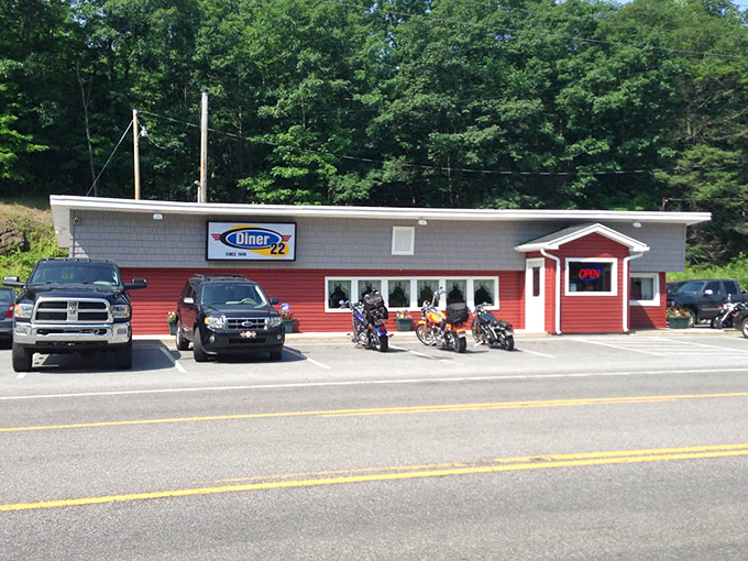 The roadside view that has welcomed hungry travelers and locals alike, with motorcycles and pickup trucks sharing parking spaces democratically.