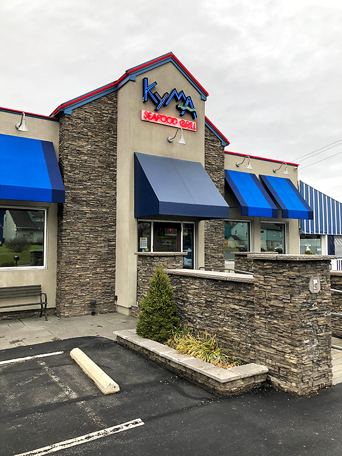 The stone façade and blue awnings of Kyma Seafood Grill stand as a beacon of hope for seafood lovers stranded in landlocked Pennsylvania.