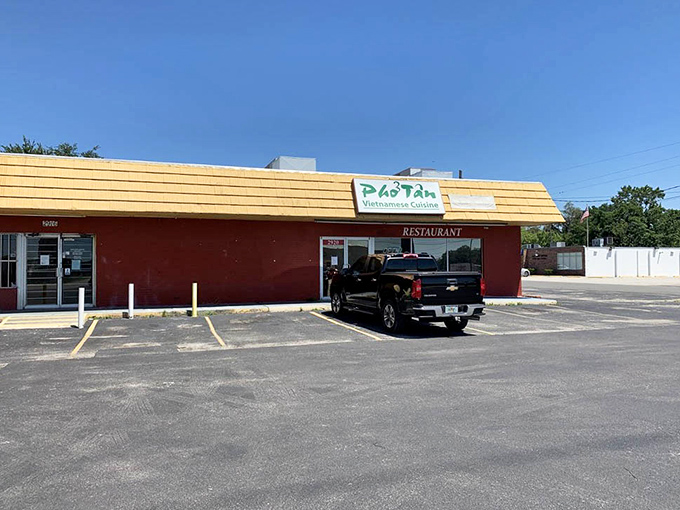 The parking lot view – where culinary adventures begin. Your car knows the way here after the first visit.