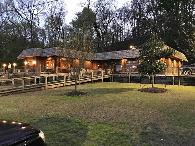 When the sun sets, Hagy's wooden exterior glows with warm light, transforming from hidden gem to beacon for hungry travelers.