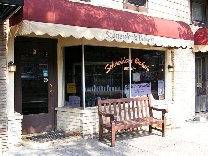 The wooden bench outside isn't just seating &ndash; it's a front-row ticket to the best show in town: watching people emerge with boxes of joy.