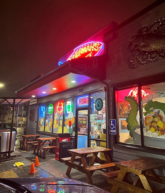 After dark, the neon glow transforms Fisherman's Market into a beacon of comfort food that calls to hungry night owls.