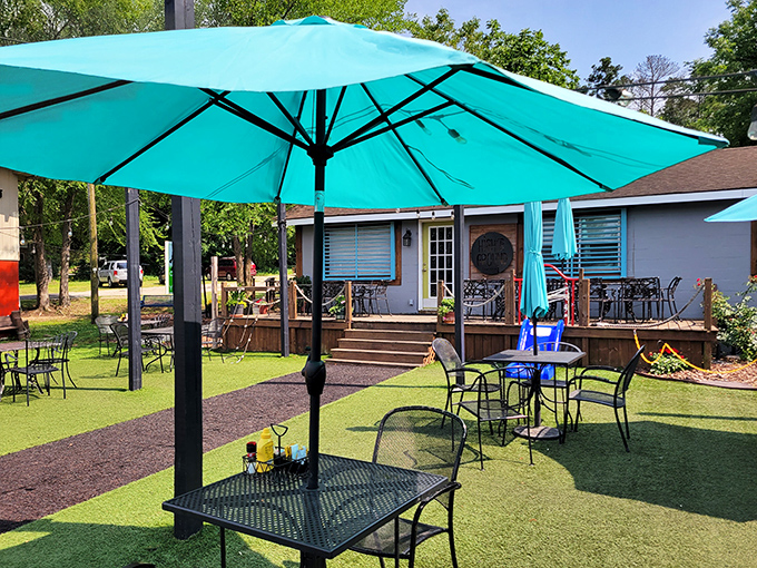 Outdoor seating under turquoise umbrellas offers a breath of fresh air with your meal&mdash;South Carolina dining as it should be.