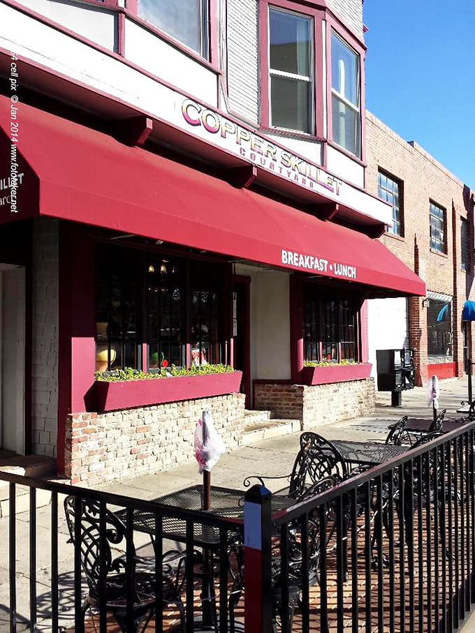 Flower boxes add a touch of color beneath windows where the aroma of bacon and coffee escapes to tempt passersby on Martinez sidewalks.