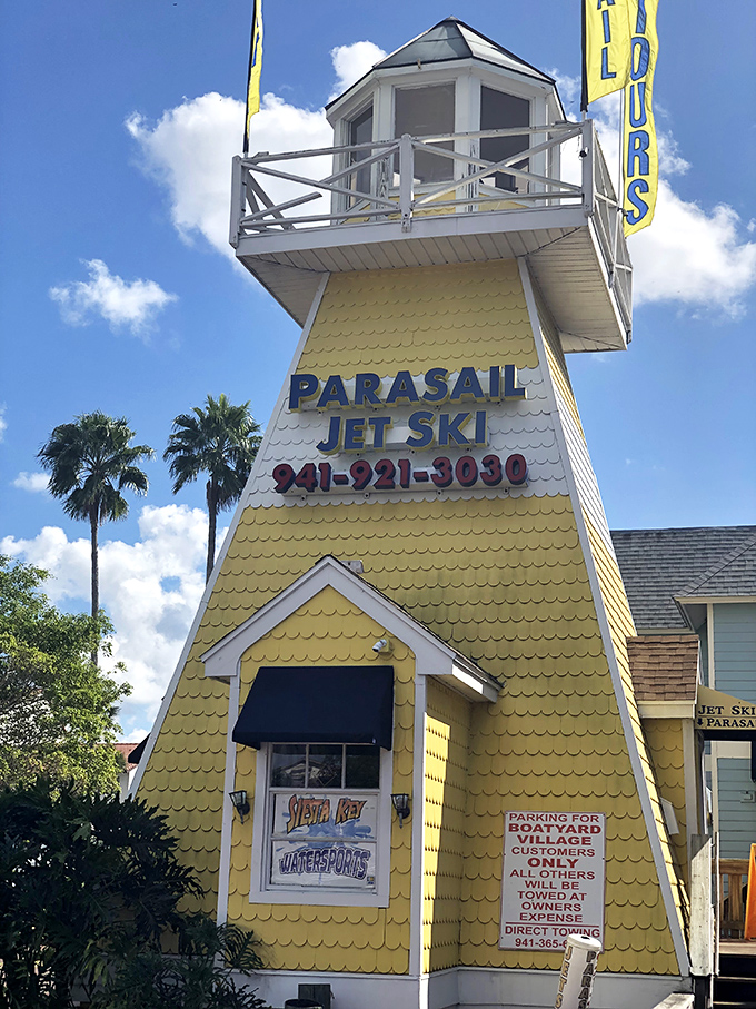 This cheerful yellow lighthouse isn't just adorable&mdash;it's your gateway to adventure. Parasailing and jet skiing await those ready to experience Siesta Key from new heights.