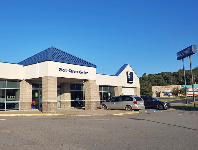 Morning light bathes the Store&bull;Career Center entrance, where bargain seekers will soon arrive for their daily treasure hunt.