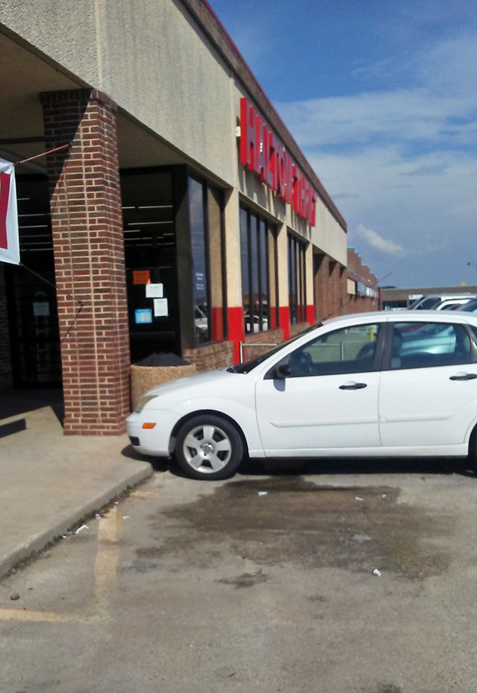 Even the parking lot has that no-frills charm that says, "We put our money into the merchandise, not fancy landscaping." Smart priorities.