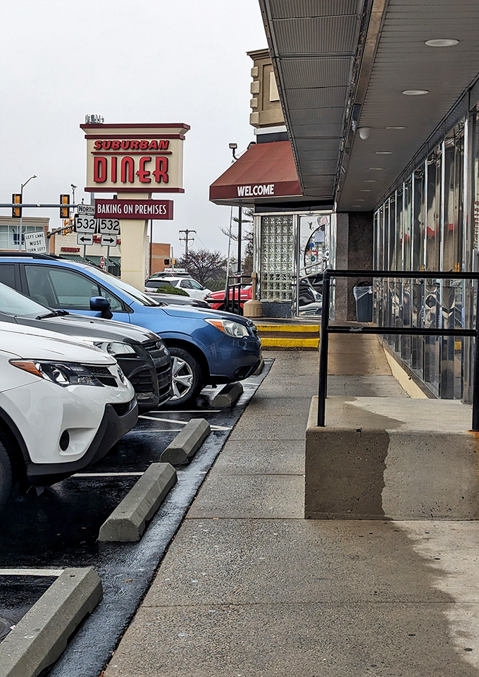 The parking lot—where anticipation begins and food comas end. Every occupied space represents someone making an excellent life decision today.