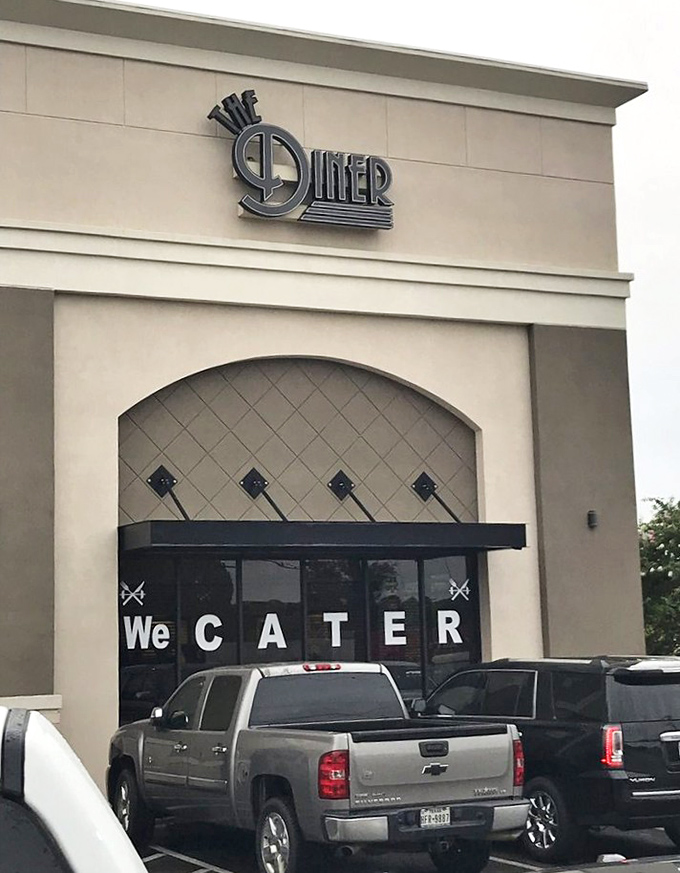 "We CATER" says the sign, but what it really means is "We'll bring the food that makes people drive across Texas right to your doorstep."