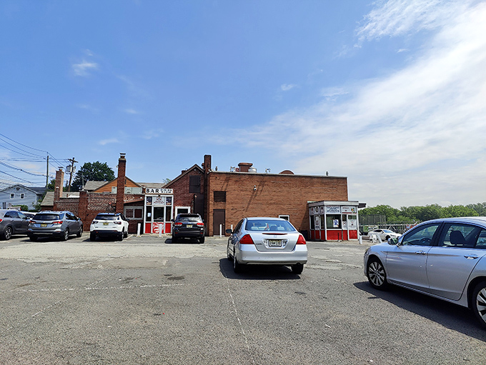 The parking lot fills with cars bearing license plates from across the tri-state area&mdash;hot dog tourism at its finest.