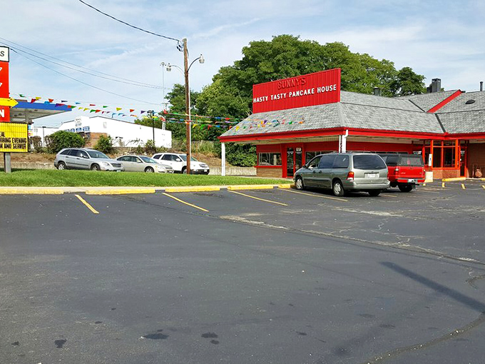 A parking lot that fills up faster than a church on Easter Sunday. The red building stands ready to welcome hungry pilgrims to the temple of breakfast.