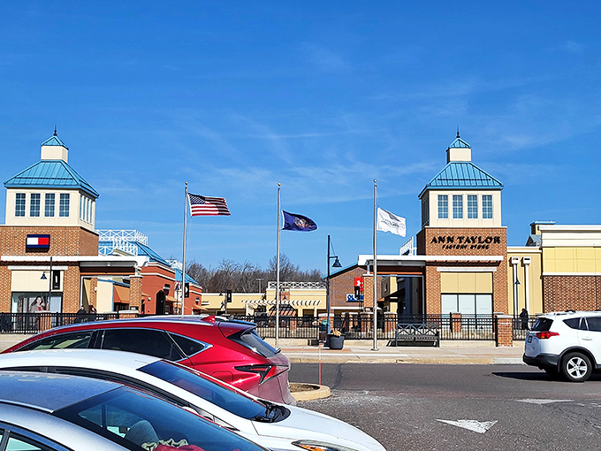 Twin towers and American flags welcome shoppers to this retail promised land. Ann Taylor Factory Store awaits those seeking workwear that works for their budget.