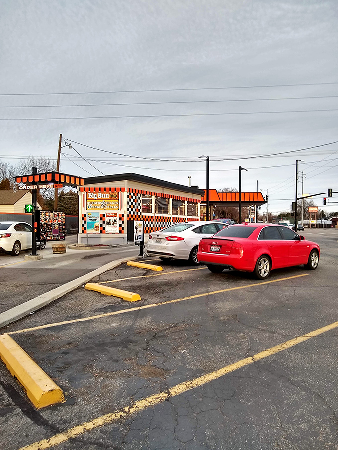 Even on a cloudy day, Big Bun's distinctive checkerboard pattern and orange awning serve as a beacon for burger enthusiasts across Boise.