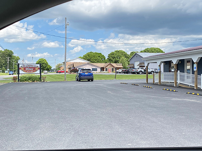 A parking lot that fills up faster than a church on Easter Sunday. During breakfast rush, finding a spot here becomes a competitive sport.