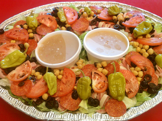 An antipasto salad that's dressed for success. Those banana peppers and pepperoni slices are playing the starring roles.