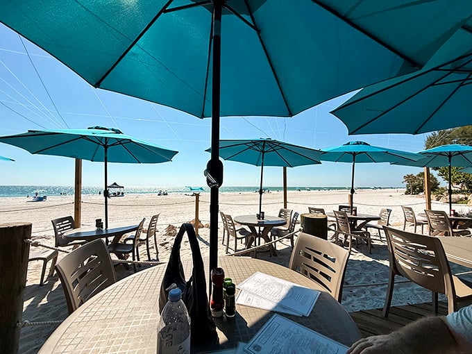 Dining with your toes in the sand isn't a metaphor here&mdash;it's Tuesday. Those turquoise umbrellas frame Gulf views like living postcards.