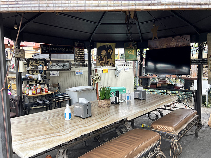 The outdoor seating area offers a perfect spot to contemplate how something as simple as smoked meat can bring such profound joy.