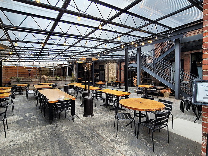 The covered patio creates an outdoor sanctuary where weather becomes irrelevant and the only forecast that matters is "100% chance of delicious."