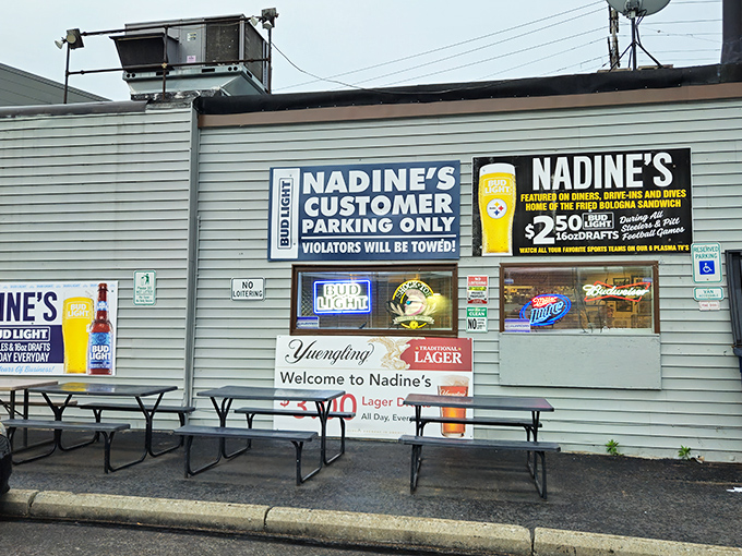 Another view of Nadine's welcoming exterior, where picnic tables await those who prefer their breakfast with a side of fresh air.