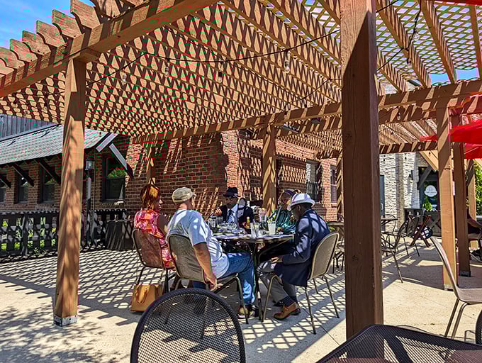 The pergola-covered patio offers al fresco dining with dappled sunlight&mdash;nature's perfect filter for both your meal and your inevitable food photos.