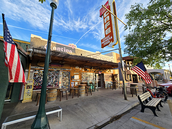 The exterior view reveals the full charm of this Boulder City institution. American flags stand at attention, perhaps saluting the quality of the hash browns within.