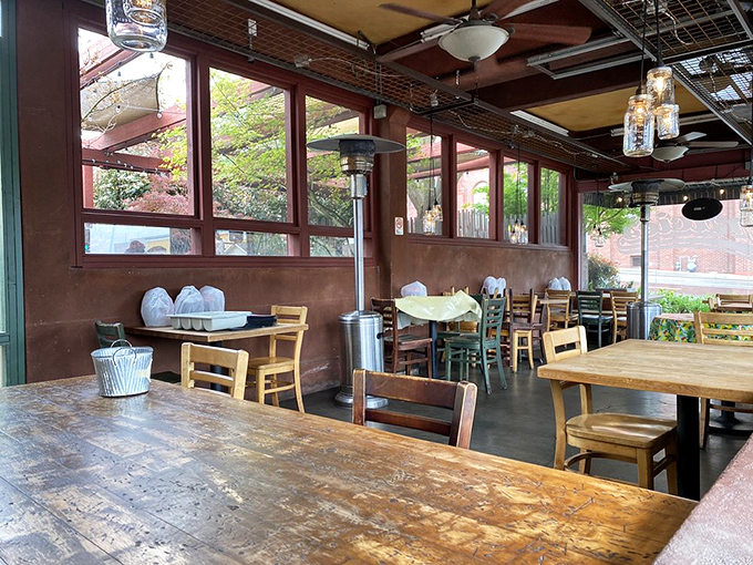 Wooden tables worn smooth by years of happy elbows &ndash; the kind of authentic patina you can't manufacture, only earn.