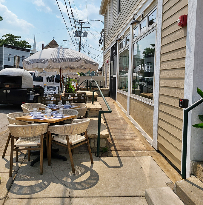 The patio offers al fresco dining under whimsical umbrellas, because sometimes you need vitamin D with your dinner.