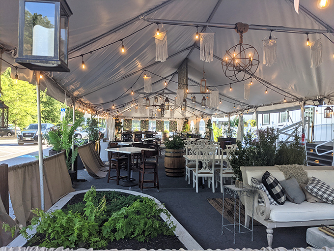 Outdoor dining that feels like you've stumbled into a Pinterest board come to life. String lights, white furniture, and greenery create al fresco magic. 