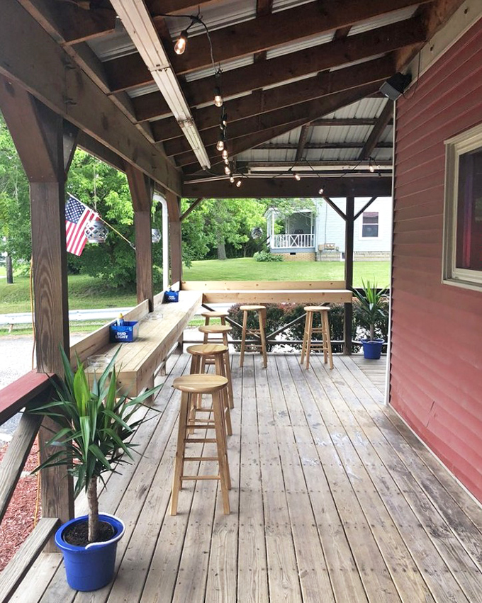 The covered porch offers a breath of fresh air and casual seating where summer evenings stretch into perfect Ohio nights.