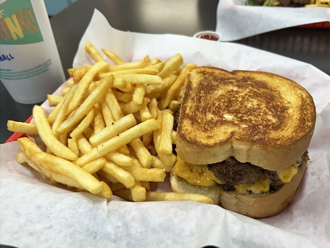 The patty melt: grilled bread hugging melted cheese and beef in perfect harmony. Comfort food that speaks directly to your soul.