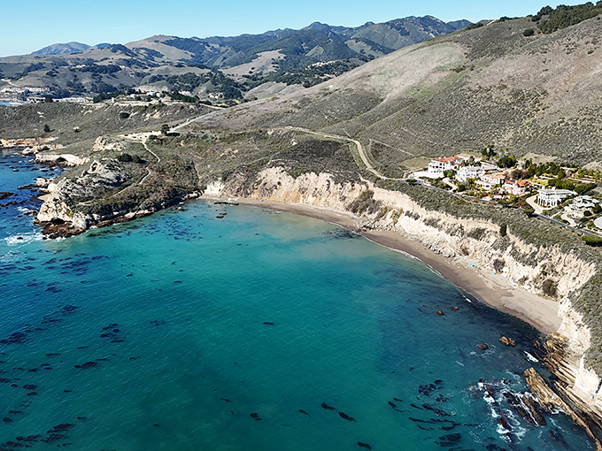 Pirates Cove Beach reveals itself like a secret treasure &ndash; turquoise waters and secluded shores that feel worlds away from everyday life.