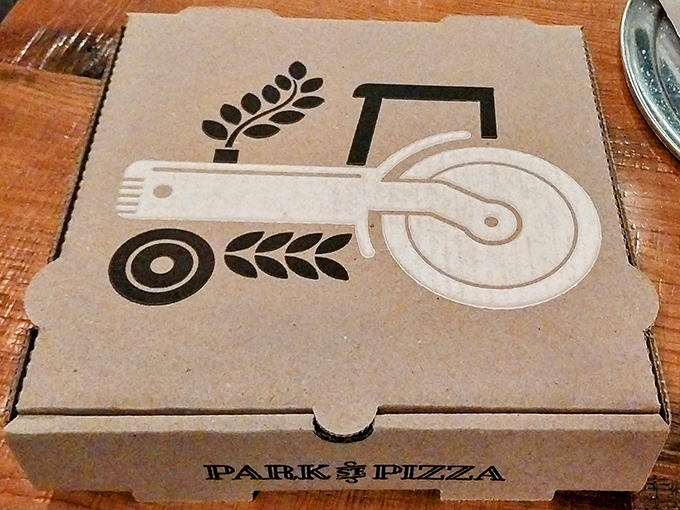 Their pizza boxes feature a charming tractor logo&mdash;a nod to local farming roots and the fresh ingredients inside this cardboard treasure chest.
