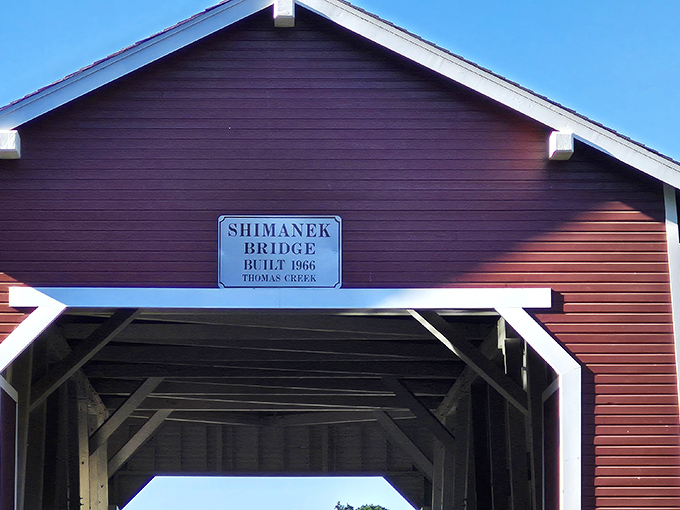 The simple plaque tells you when it was built, but not how many marriage proposals, family photos, and moments of wonder have happened here since.