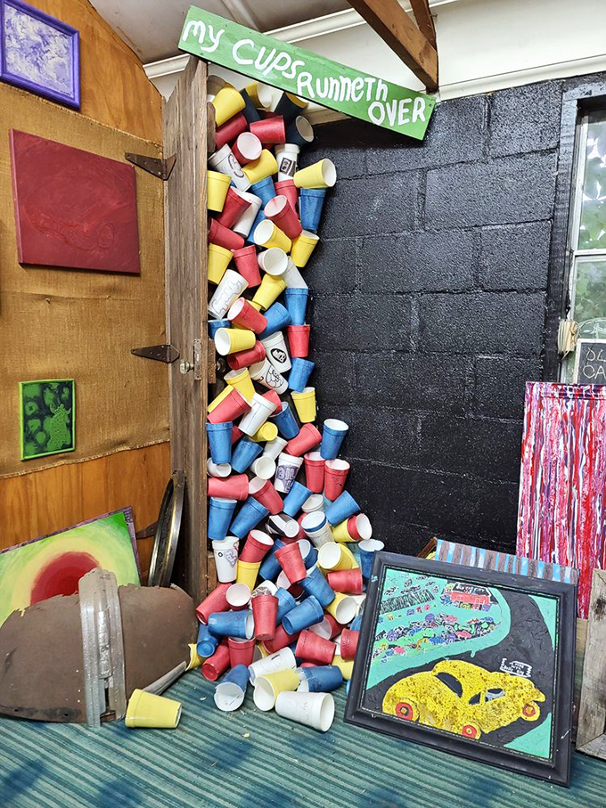 My cups runneth over indeed! The styrofoam cup collection spills artistically from the wall, showcasing another dimension of the owner's creative vision.