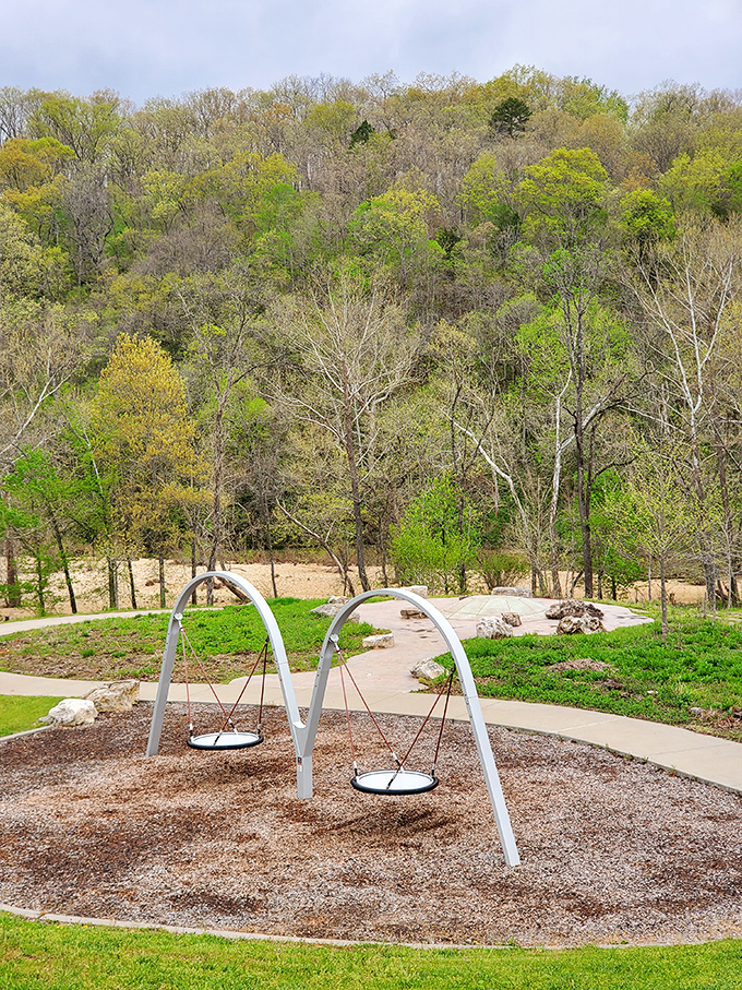 Modern playground equipment nestled in ancient hills&mdash;where kids can swing through time while parents soak in million-year-old views.