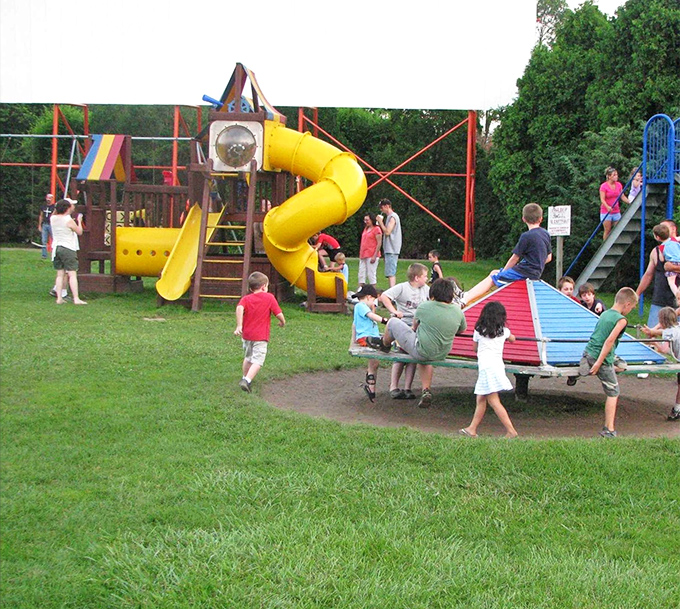 The playground keeps younger viewers entertained before showtime. Smart parents know: tired kids make better movie-watching companions later!