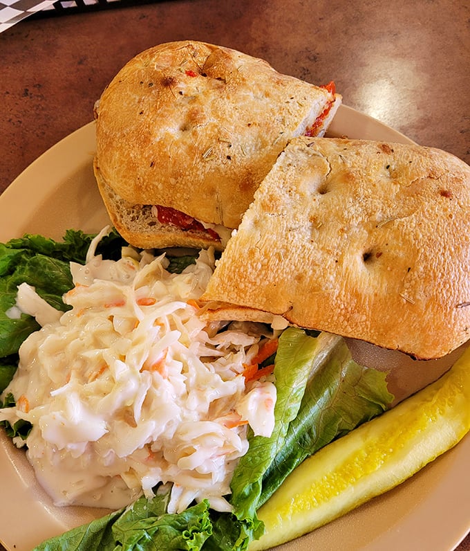 This sandwich isn't just lunch&mdash;it's architecture with coleslaw foundations and pickle buttresses supporting a masterpiece of flavor.