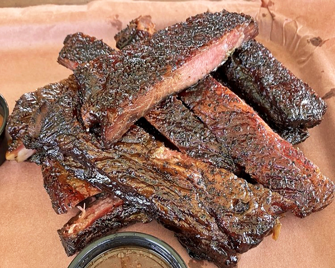 Ribs that make you reconsider your life choices. Why haven't you been eating these every day? The perfect balance of chew, tenderness, and smoke.
