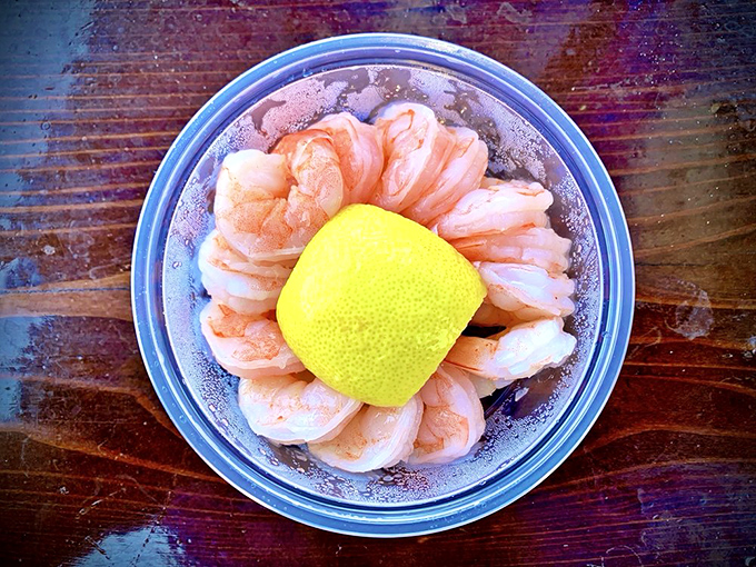 A ring of plump prawns surrounding a bright lemon sun. This seafood cocktail is California's answer to the crown jewels.