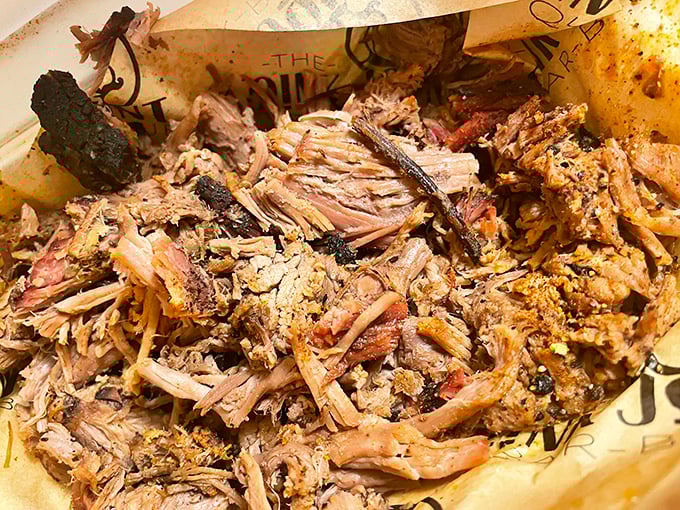 Pulled pork in its natural habitat &ndash; tender, smoky, and ready for its close-up. Each strand tells the story of patience and proper smoking technique.