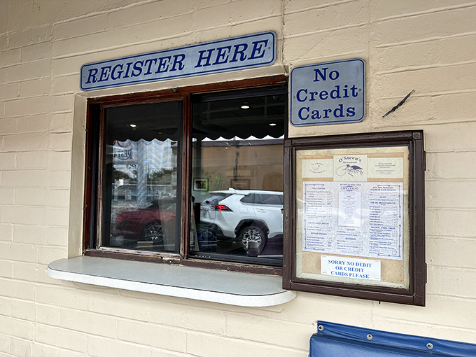 The "No Credit Cards" sign isn't a warning, it's a badge of honor for a place that knows itself.