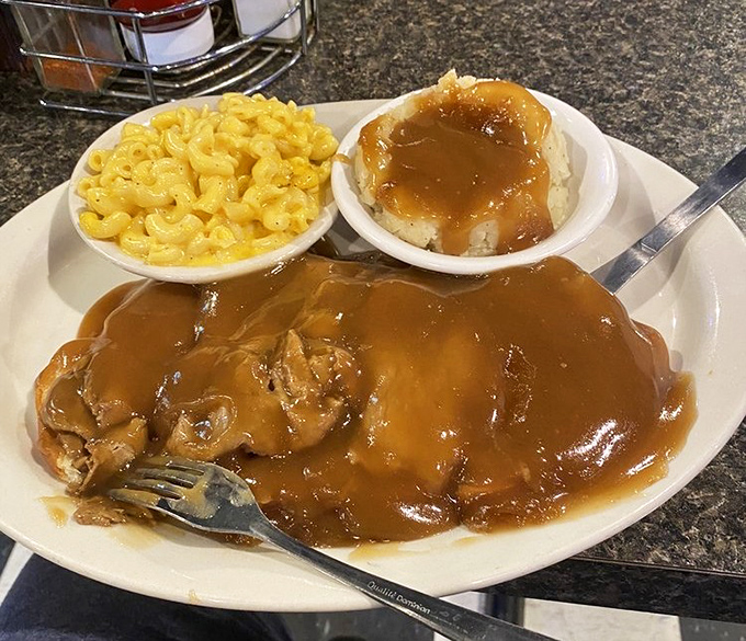 Roast beef swimming in gravy with mac and cheese proves that sometimes you need comfort food to comfort your comfort food.