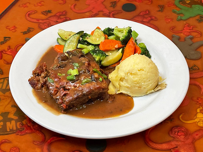 Meatloaf that would make your grandmother simultaneously proud and jealous. That gravy deserves its own fan club.