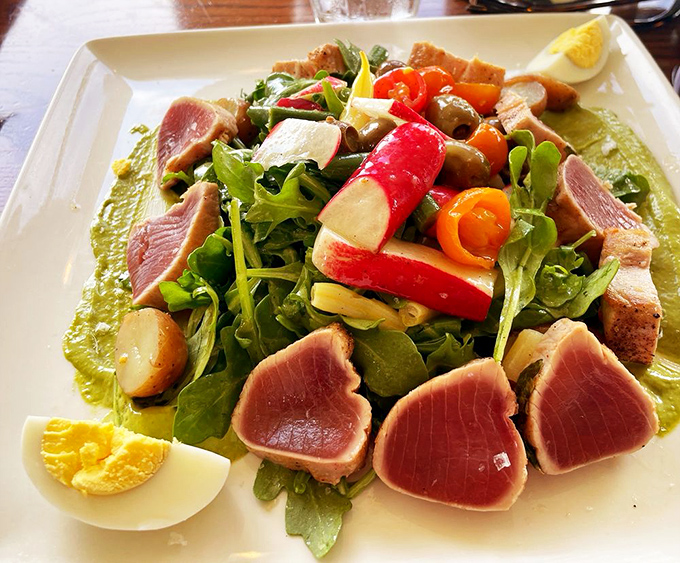 A salad that's having an identity crisis in the best way possible&mdash;fresh greens playing host to ruby-red tuna that steals the show.