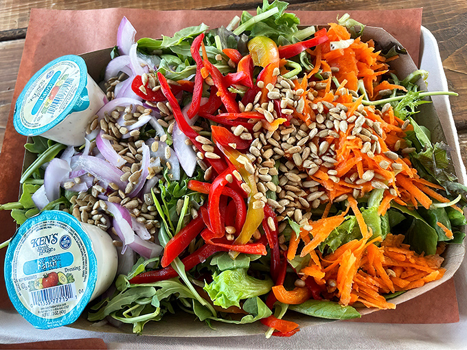 A salad that doesn't feel like punishment. This colorful creation proves vegetables can hang with the cool kids at a BBQ joint.