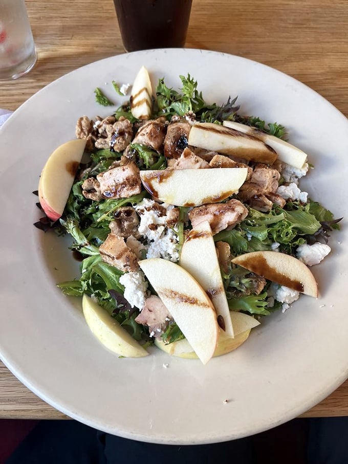 A salad that doesn't feel like punishment. Fresh greens, apples, and protein make healthy eating something to celebrate.