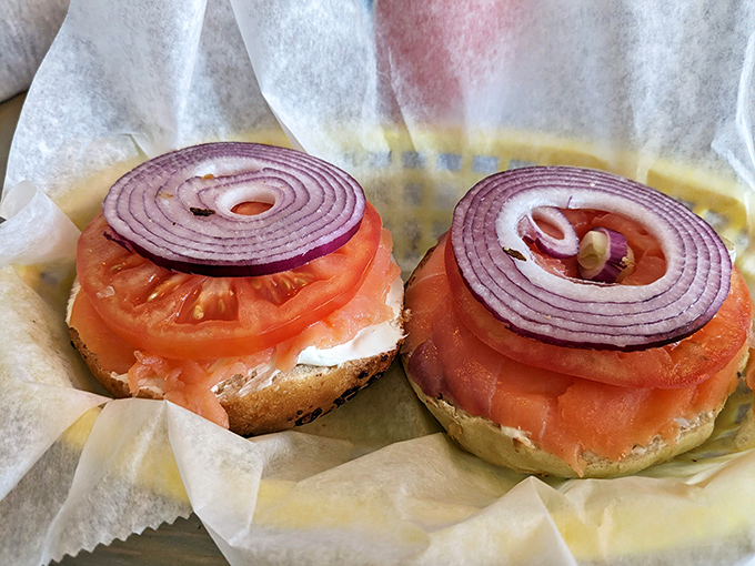 Lox and cream cheese on a bagel with red onion rings, because some combinations were simply meant to be.